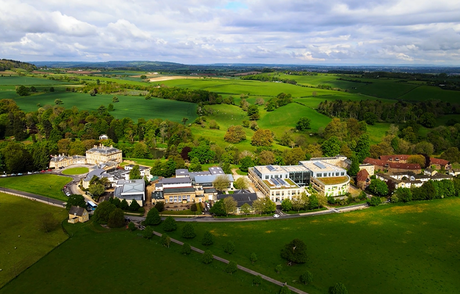 Aerial View Of Newton Park Campus Buildings And Green Fields